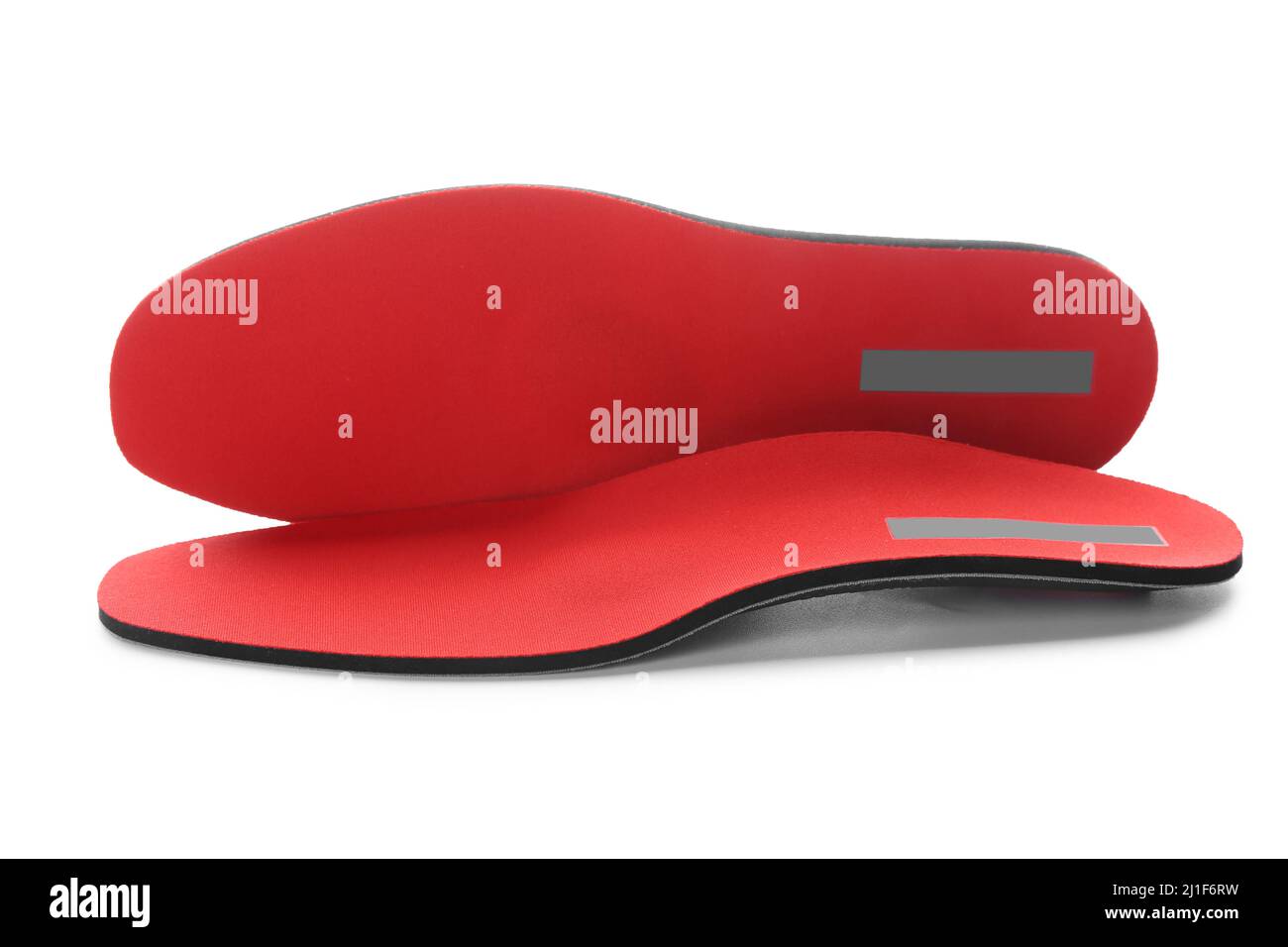 Red orthopedic insoles isolated on white background Stock Photo - Alamy