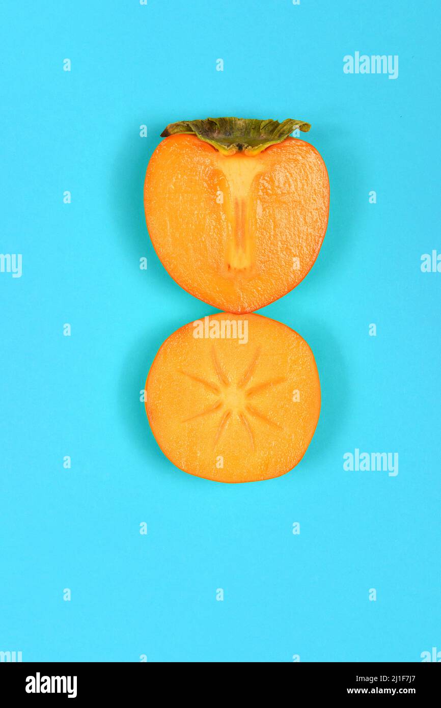 Orange ripe persimmon. Persimmon fruit. Orang fruits slice cut out. High resolution photo. Full ...