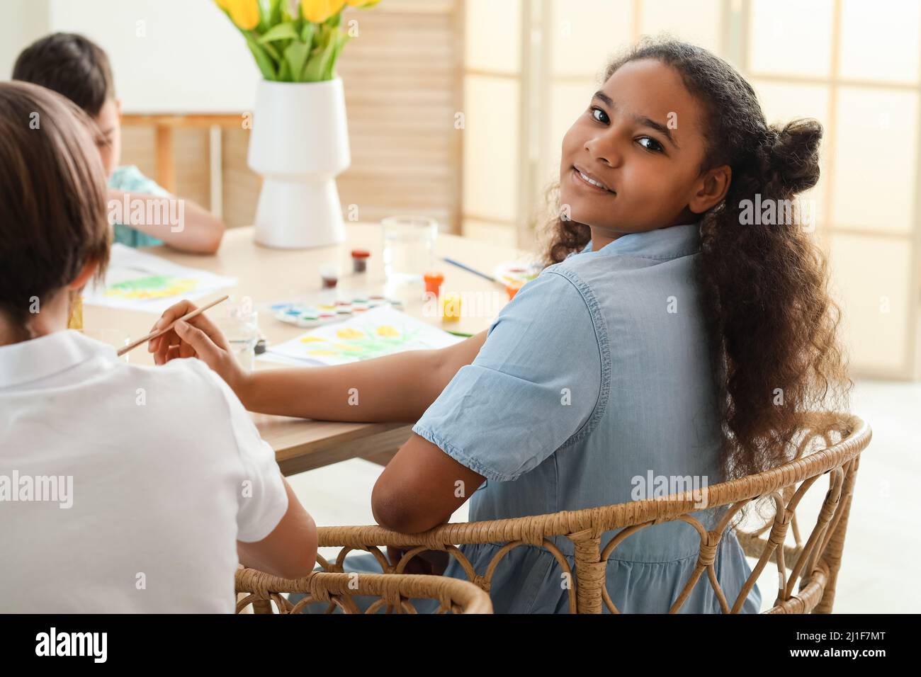 Cute children painting during master-class in art Stock Photo - Alamy
