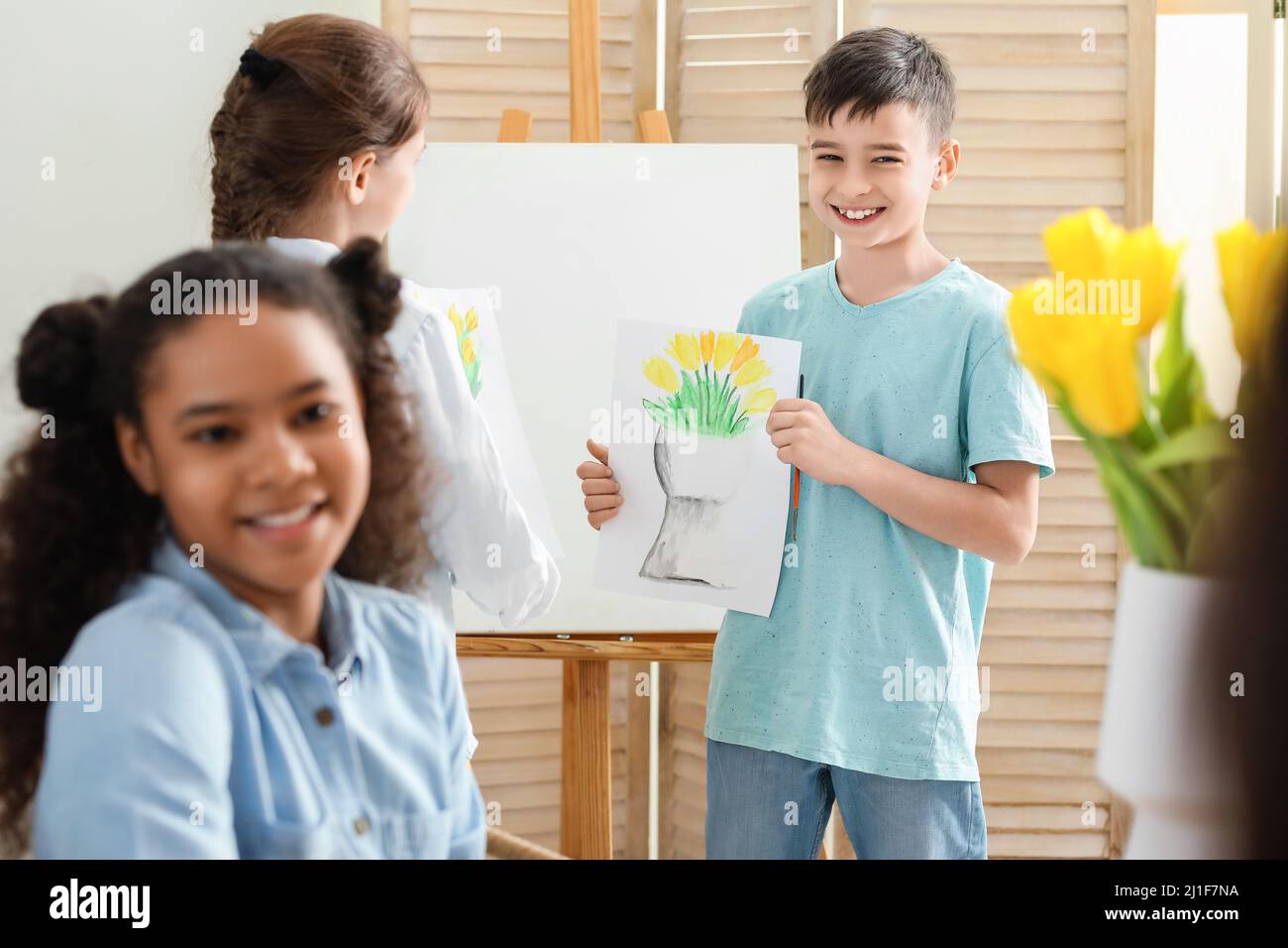Cute children painting during master-class in art Stock Photo - Alamy