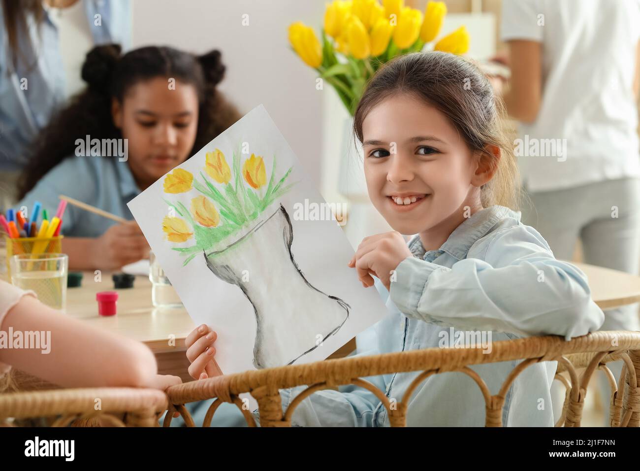 Cute girl during master-class in art Stock Photo - Alamy