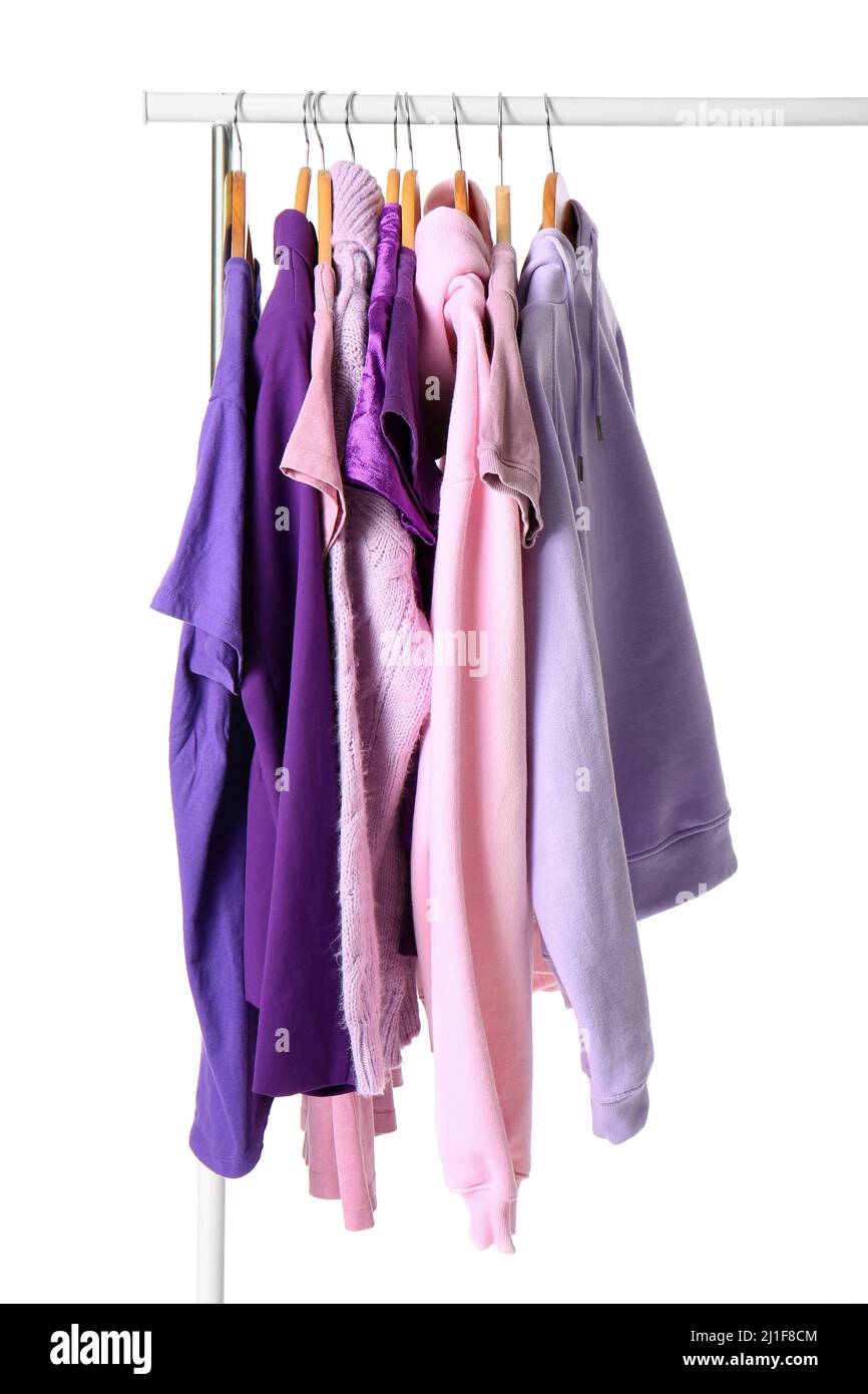 Rack with female clothes on white background Stock Photo - Alamy