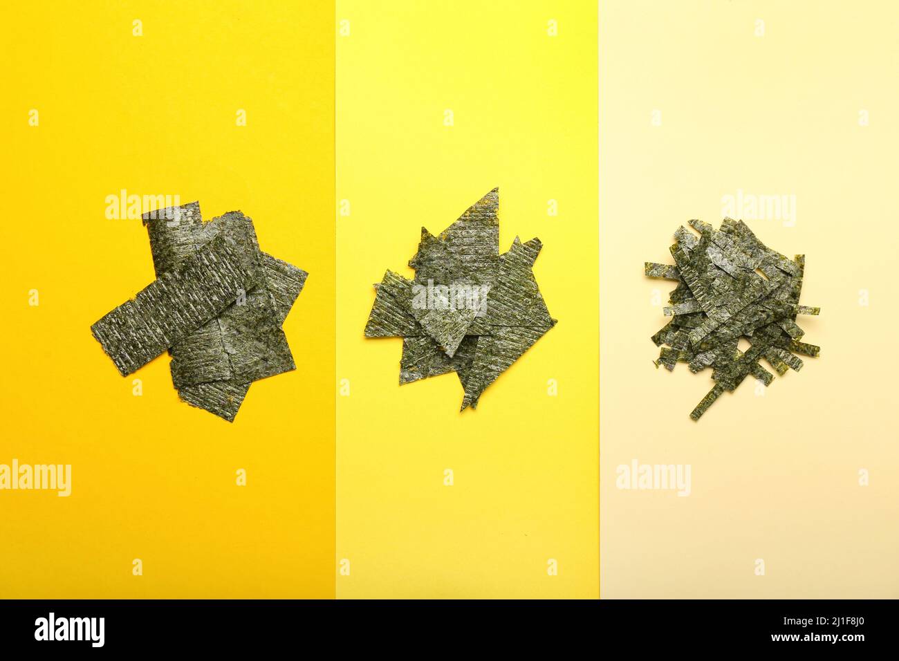 Natural seaweed sheets on color background Stock Photo - Alamy