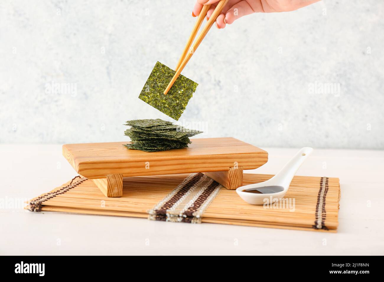 Seaweed eating woman hi-res stock photography and images - Alamy