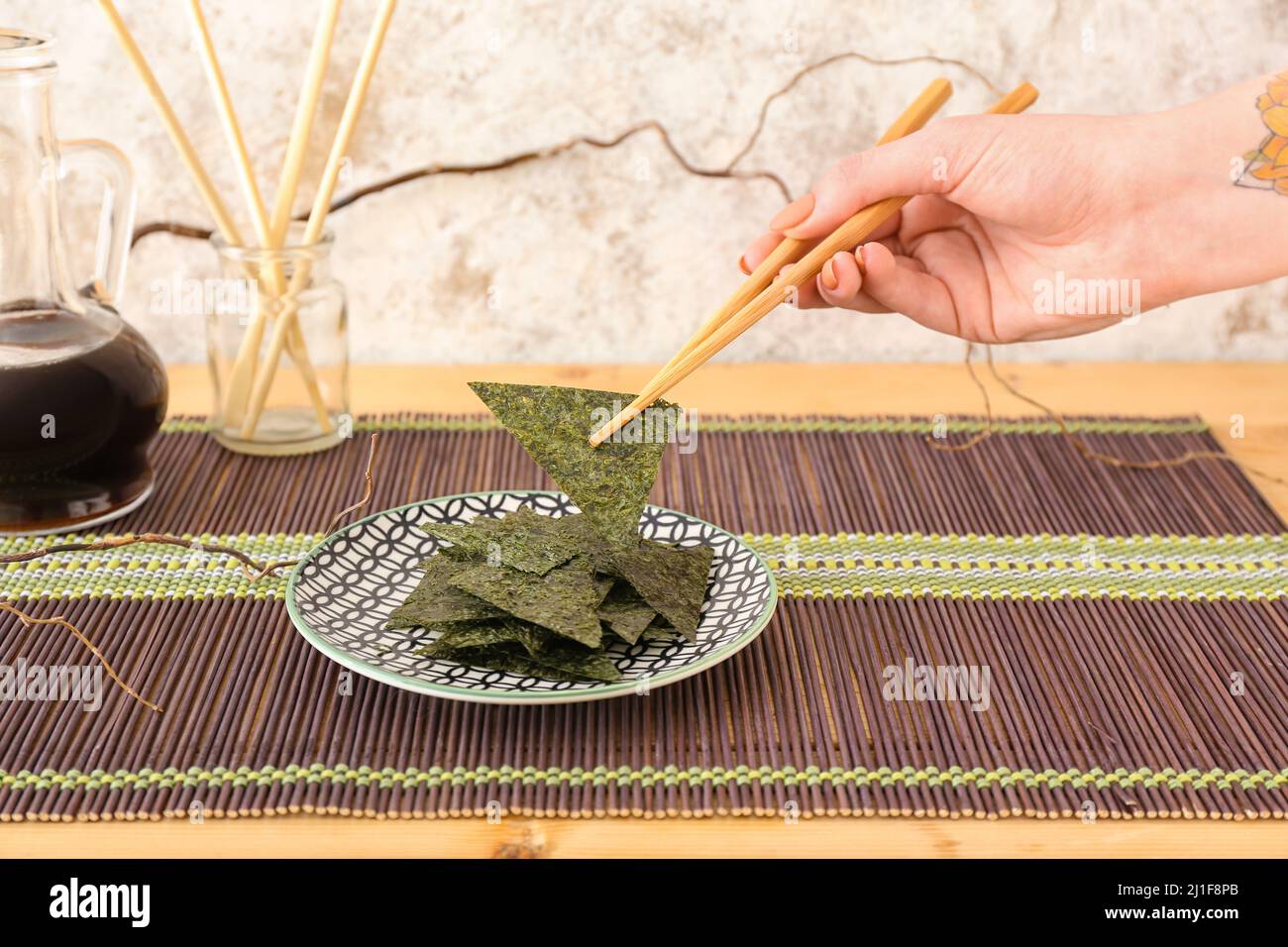 Seaweed eating woman hi-res stock photography and images - Alamy