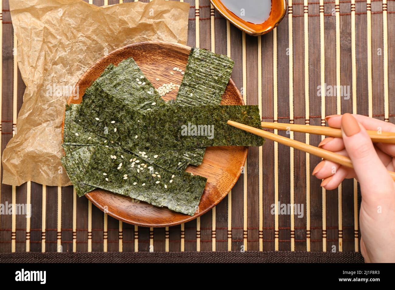 Woman seaweed eating hi-res stock photography and images - Alamy