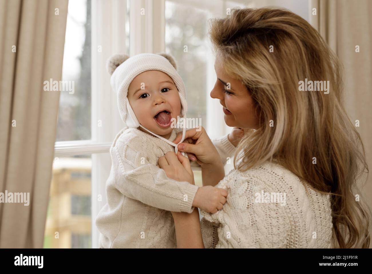 Put on hat child hi-res stock photography and images - Alamy