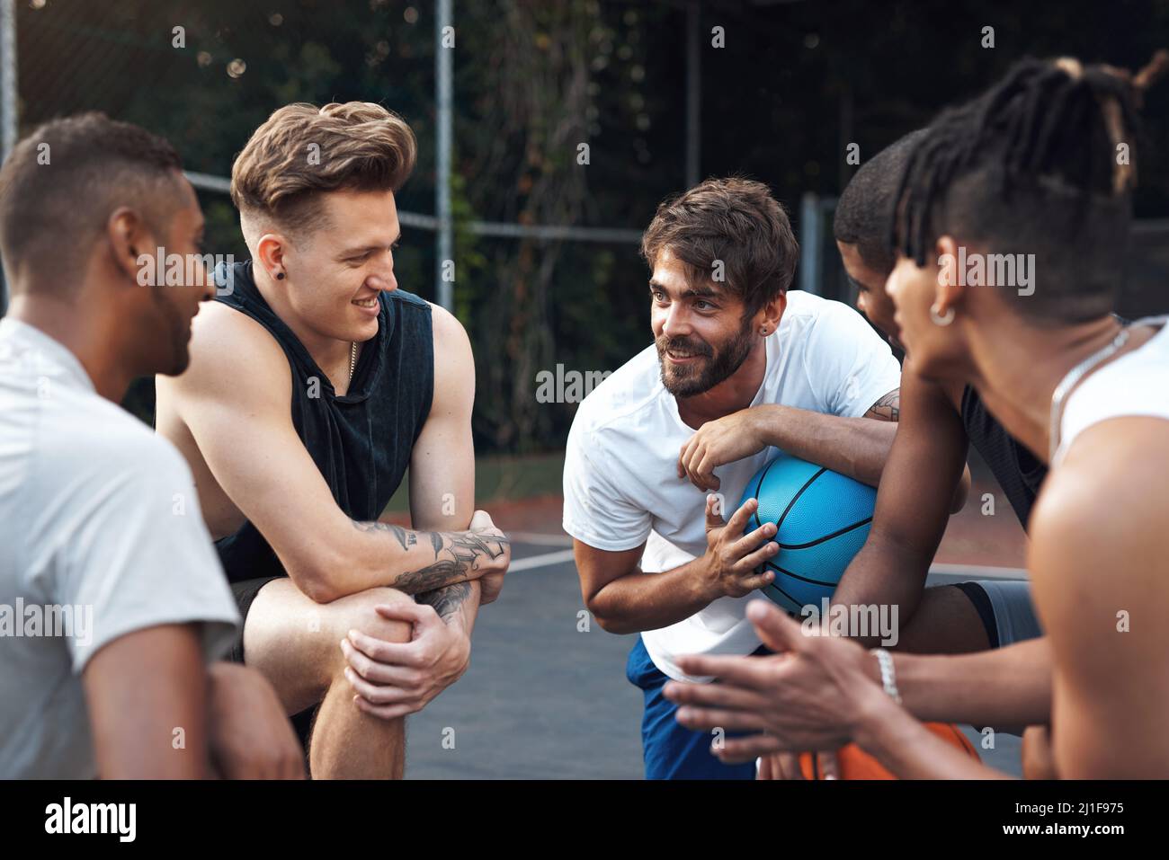 Group diverse team male basketball hi-res stock photography and images ...