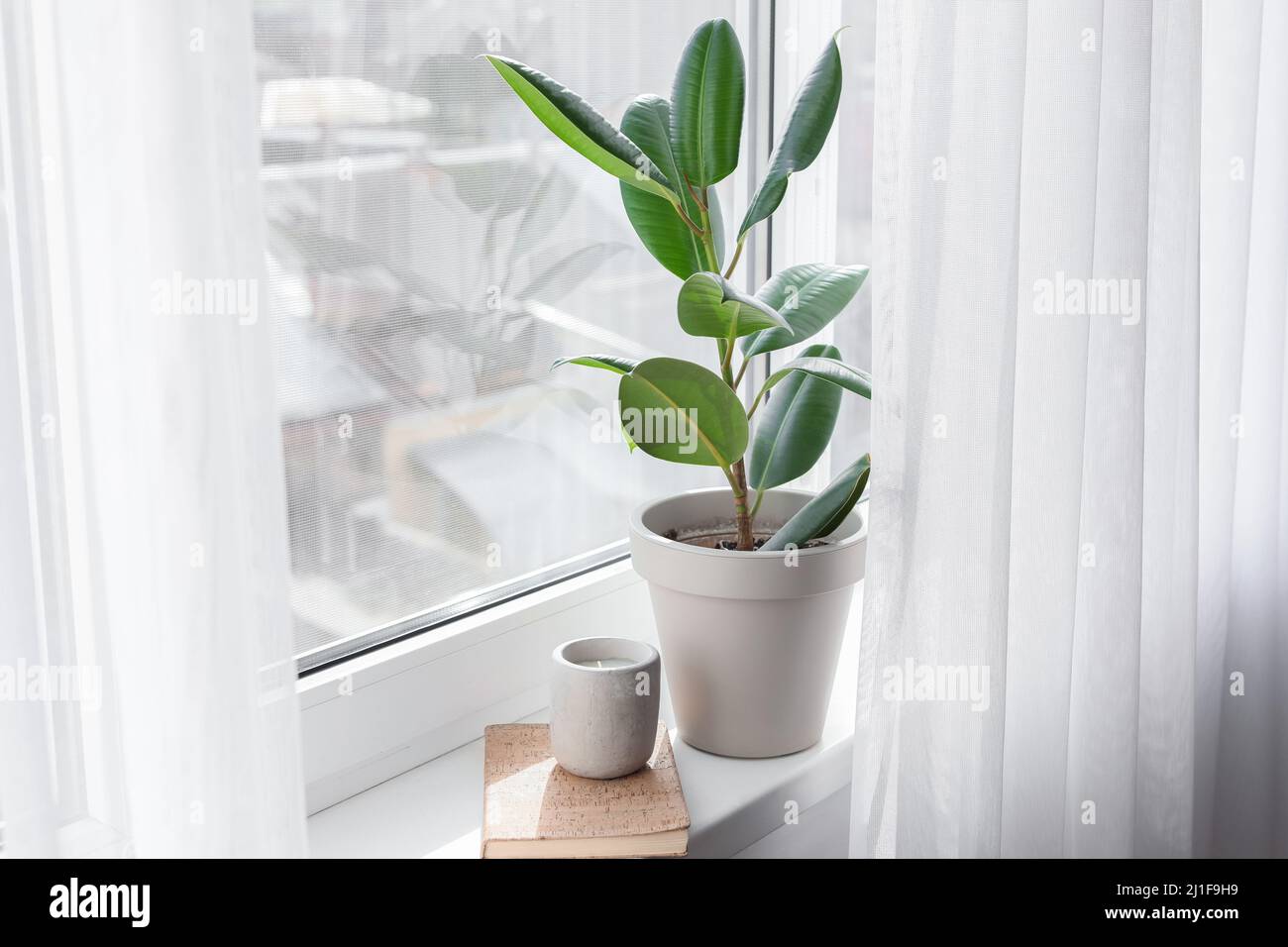 Candle book on sill window hi-res stock photography and images - Alamy