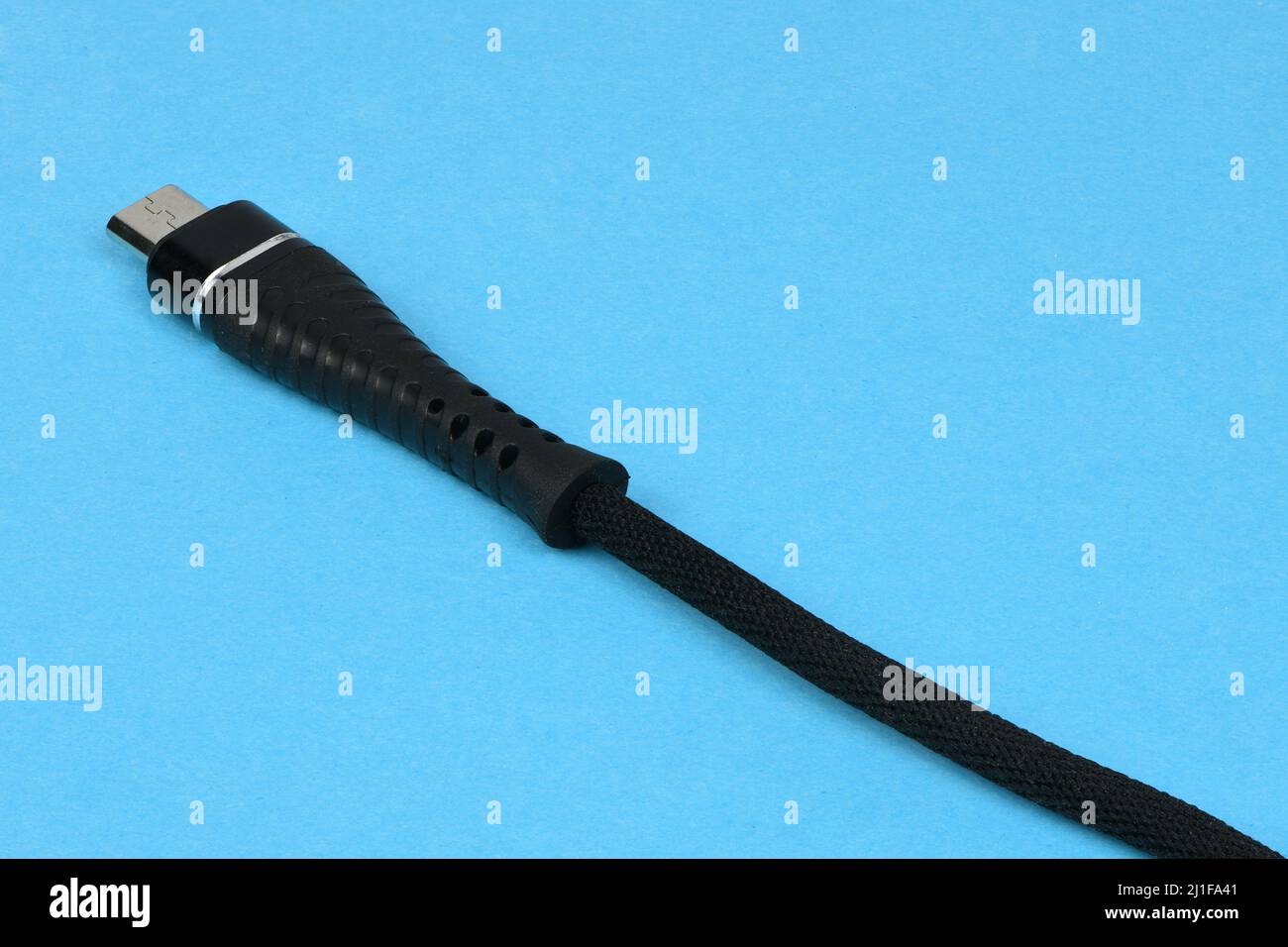 Closeup of an USB connector isolated on blue. High resolution photo ...