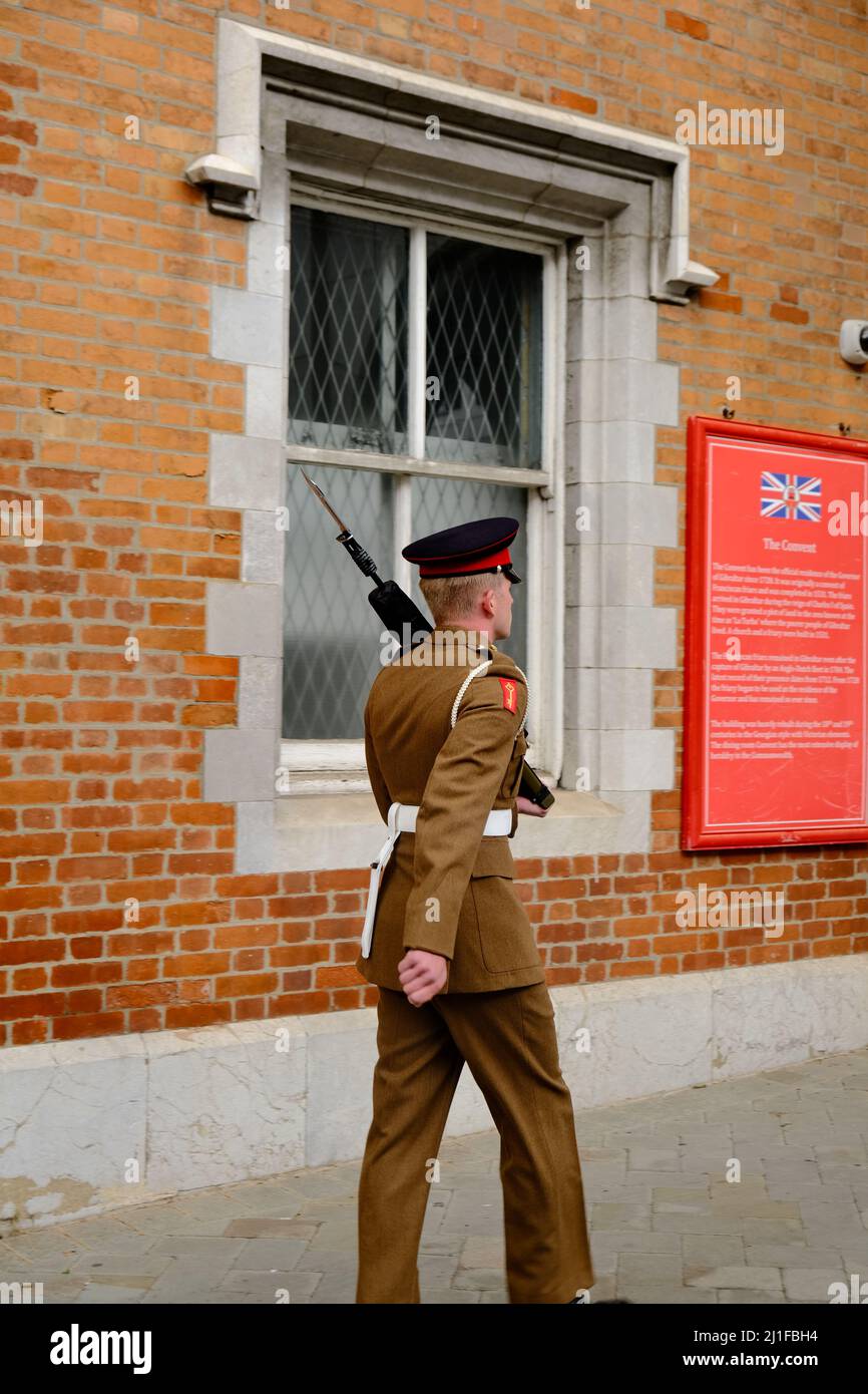 Typical british guard patrolling around gibraltar Stock Photo - Alamy