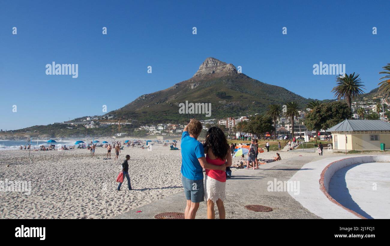 Couple viewing Lion's Head from Clifton Beach Stock Photo - Alamy