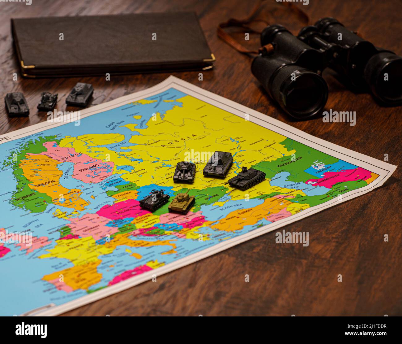 Toy tanks on the map. Military operations in Ukraine Stock Photo - Alamy