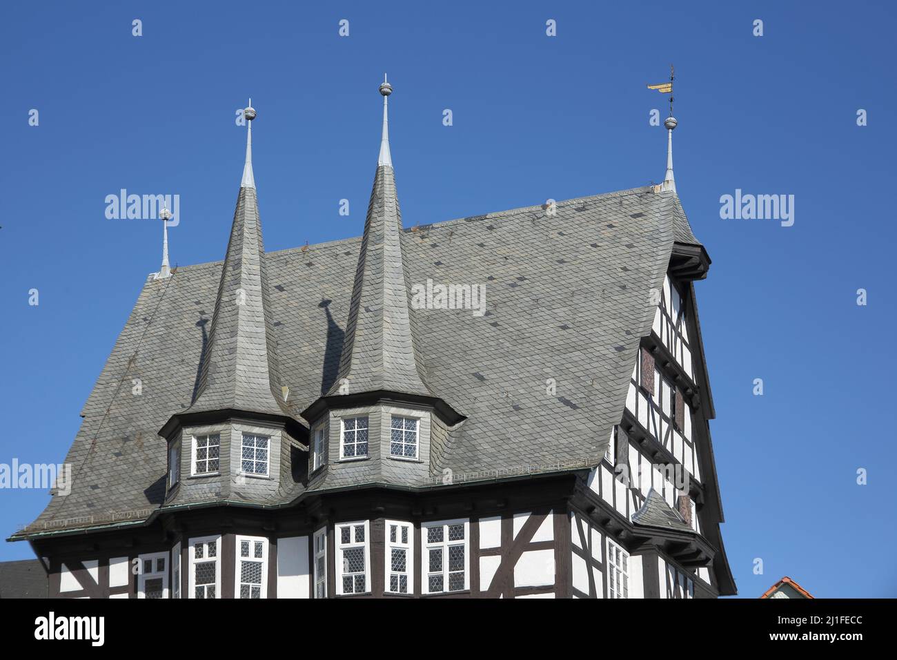Slate roof with turrets of the town hall built 1512-1516 in Alsfeld ...