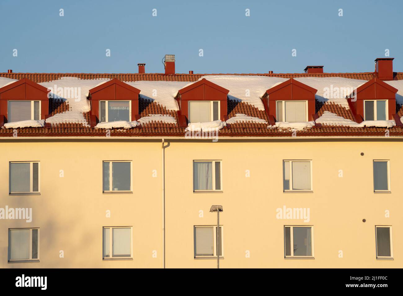 Rovaniemi, Finland - March 16th, 2022: Melting snow on a traditional ...