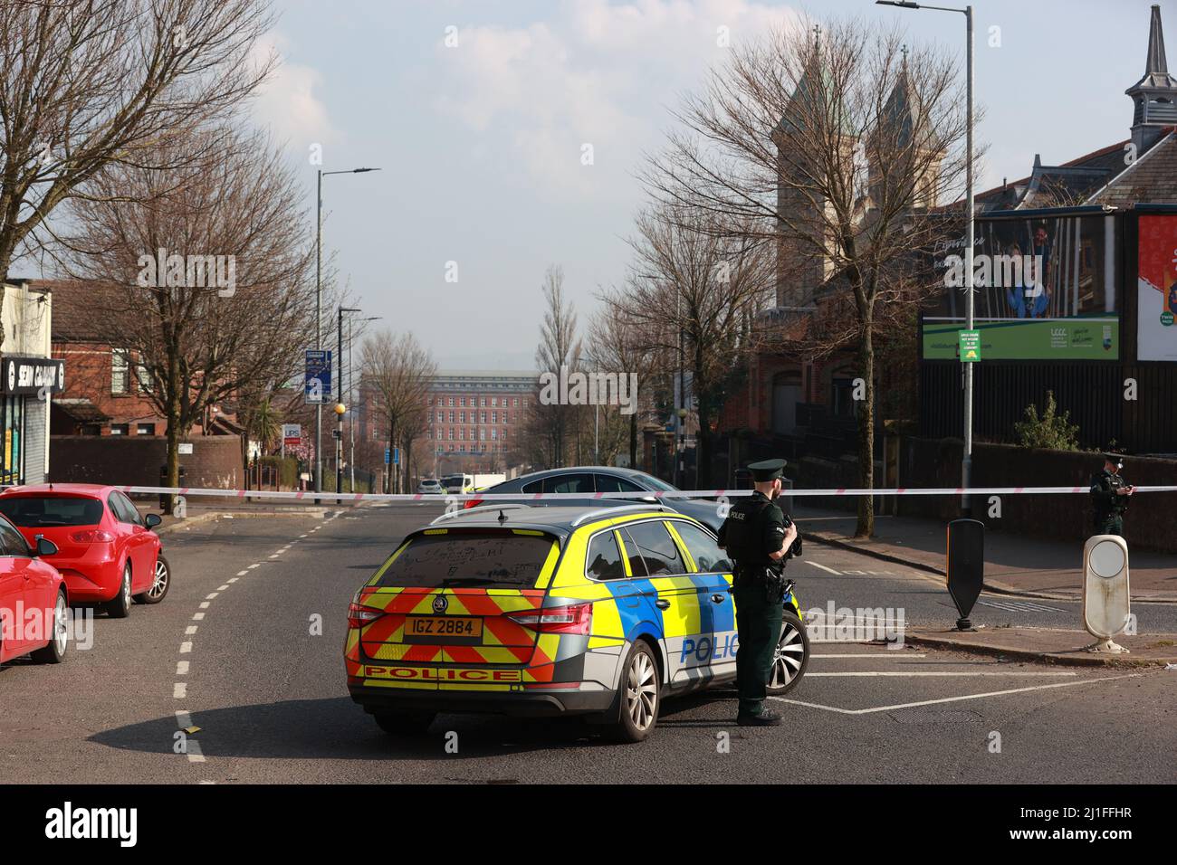 PSNI officers patrol a cordon at the Holy Cross church where emergency ...