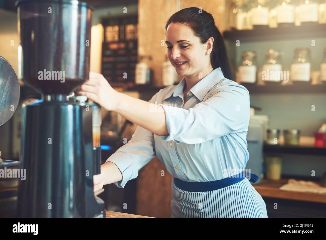 Beautiful young female barista hi-res stock photography and images - Alamy