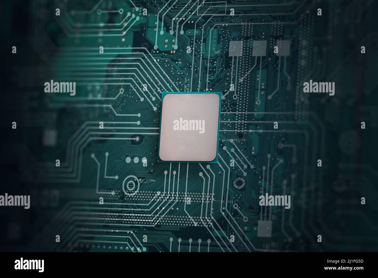 CPU chip and green motherboard with circuit lines. Tehnology concept ...