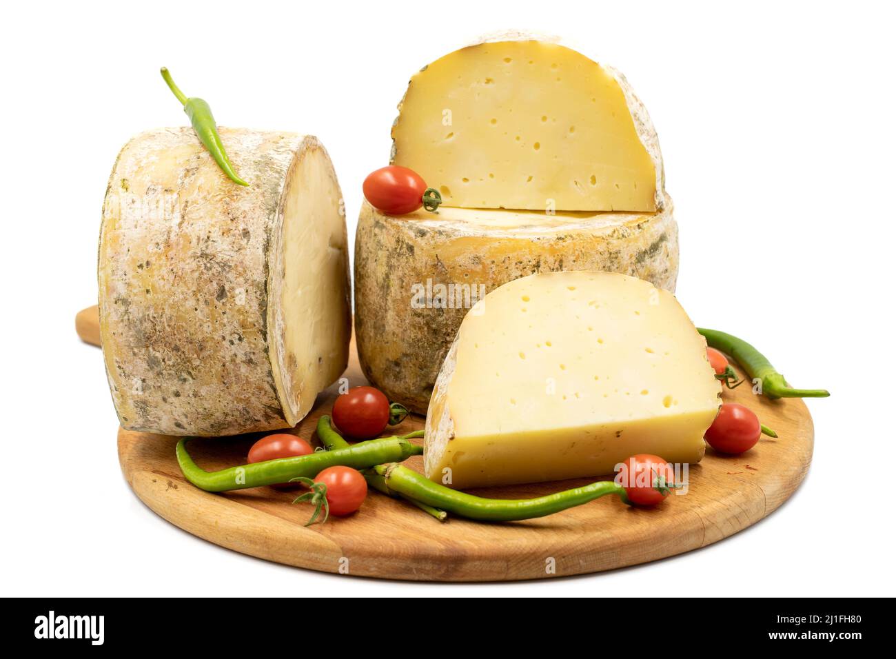 Goat cheddar cheese isolated on a white background. close up Stock ...