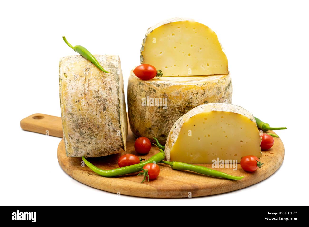 Goat cheddar cheese isolated on a white background. close up Stock ...