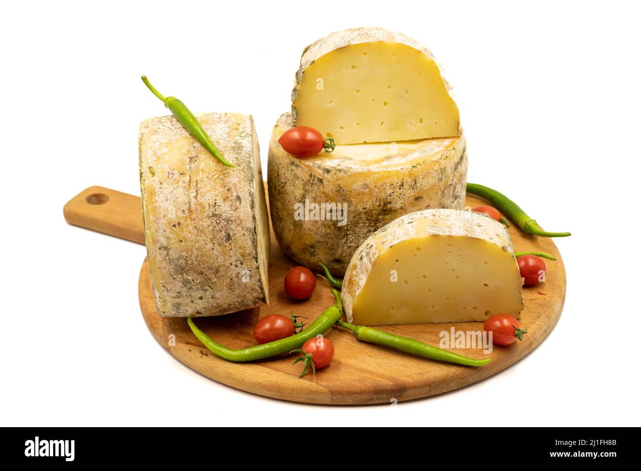 Goat cheddar cheese isolated on a white background. close up Stock ...