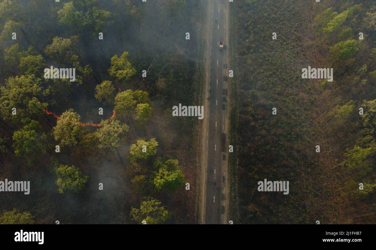 Nijgad, Nepal. 25th Mar, 2022. Wildfires engulf a section of the Nijgad ...