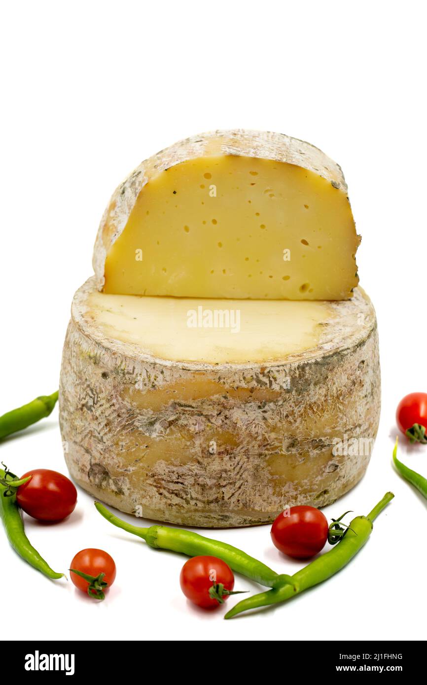 Goat cheddar cheese isolated on a white background. close up Stock ...