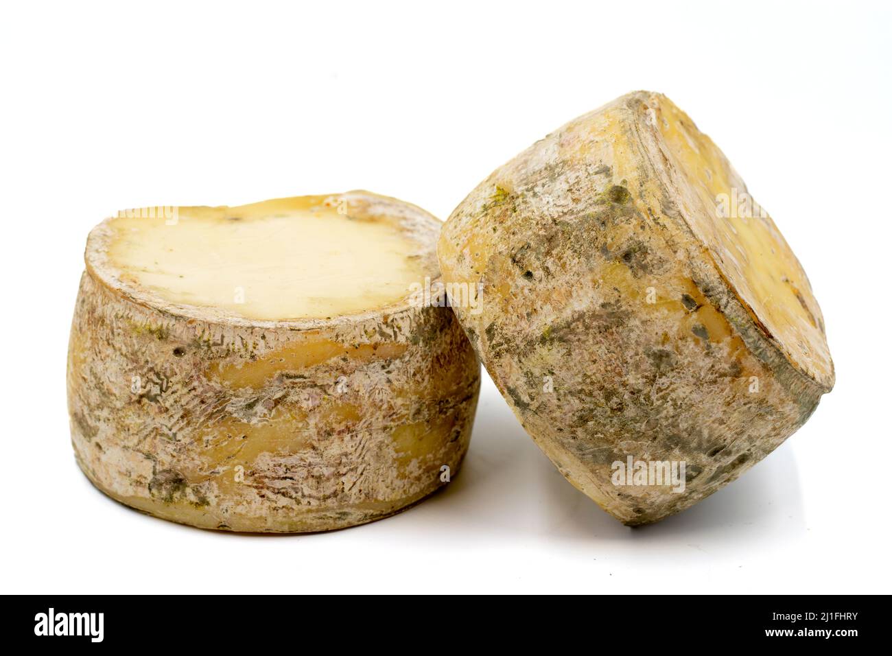 Goat cheddar cheese isolated on a white background. close up Stock ...