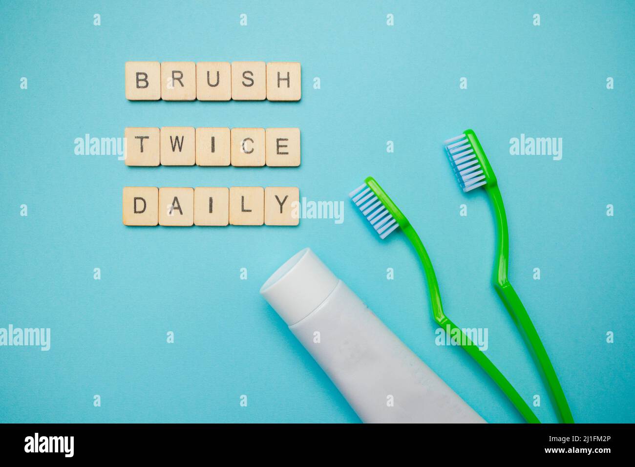 Oral and dental health concept showing two toothbrushes and toothpaste ...