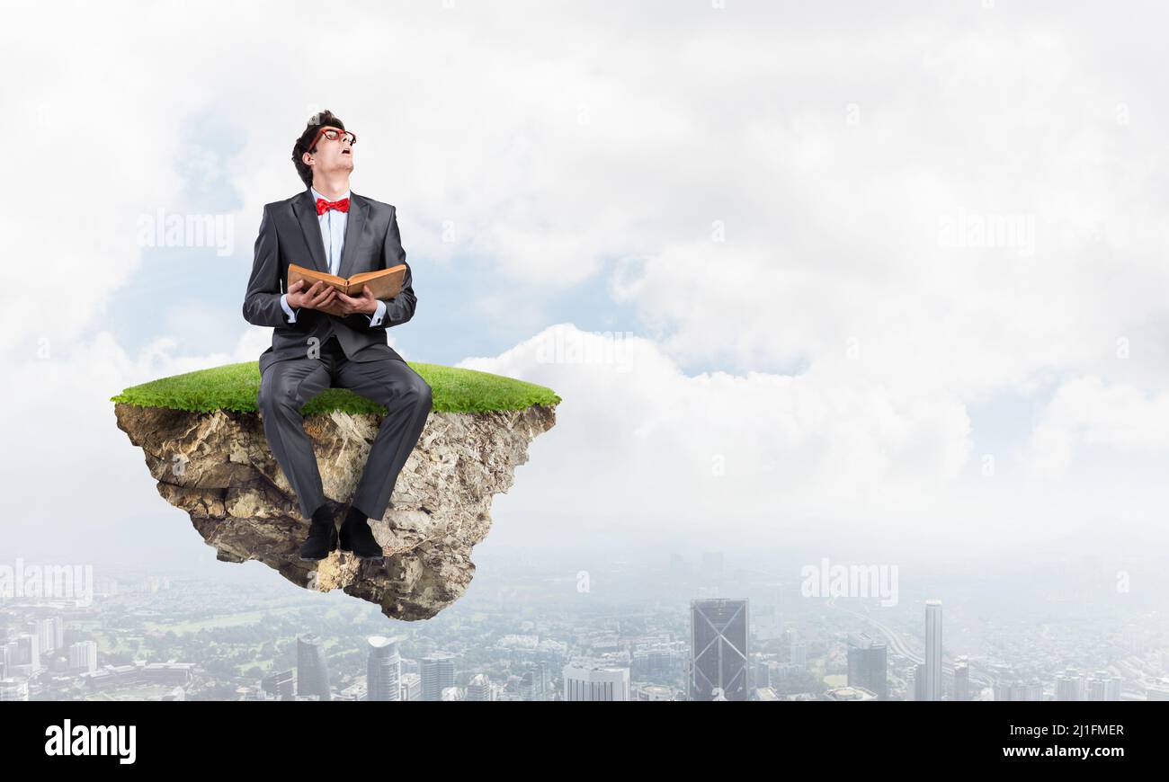 Young student with a book Stock Photo - Alamy