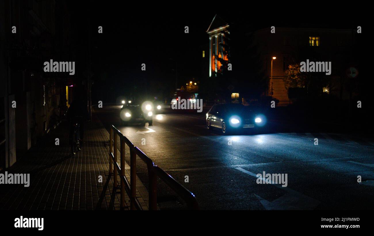 a view of a city street at night wich no power Stock Photo - Alamy