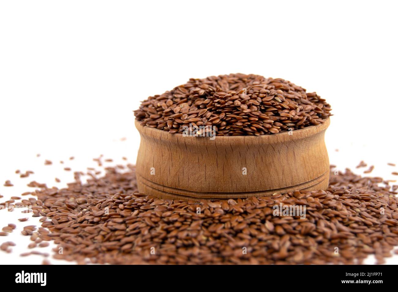 Healthy brown flaxseed in wooden bowl isolated on white background Stock Photo - Alamy