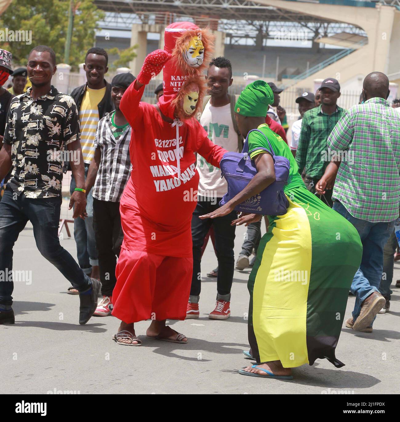 Young Africans sc (right) and Simba S.C fan cheering before the start ...