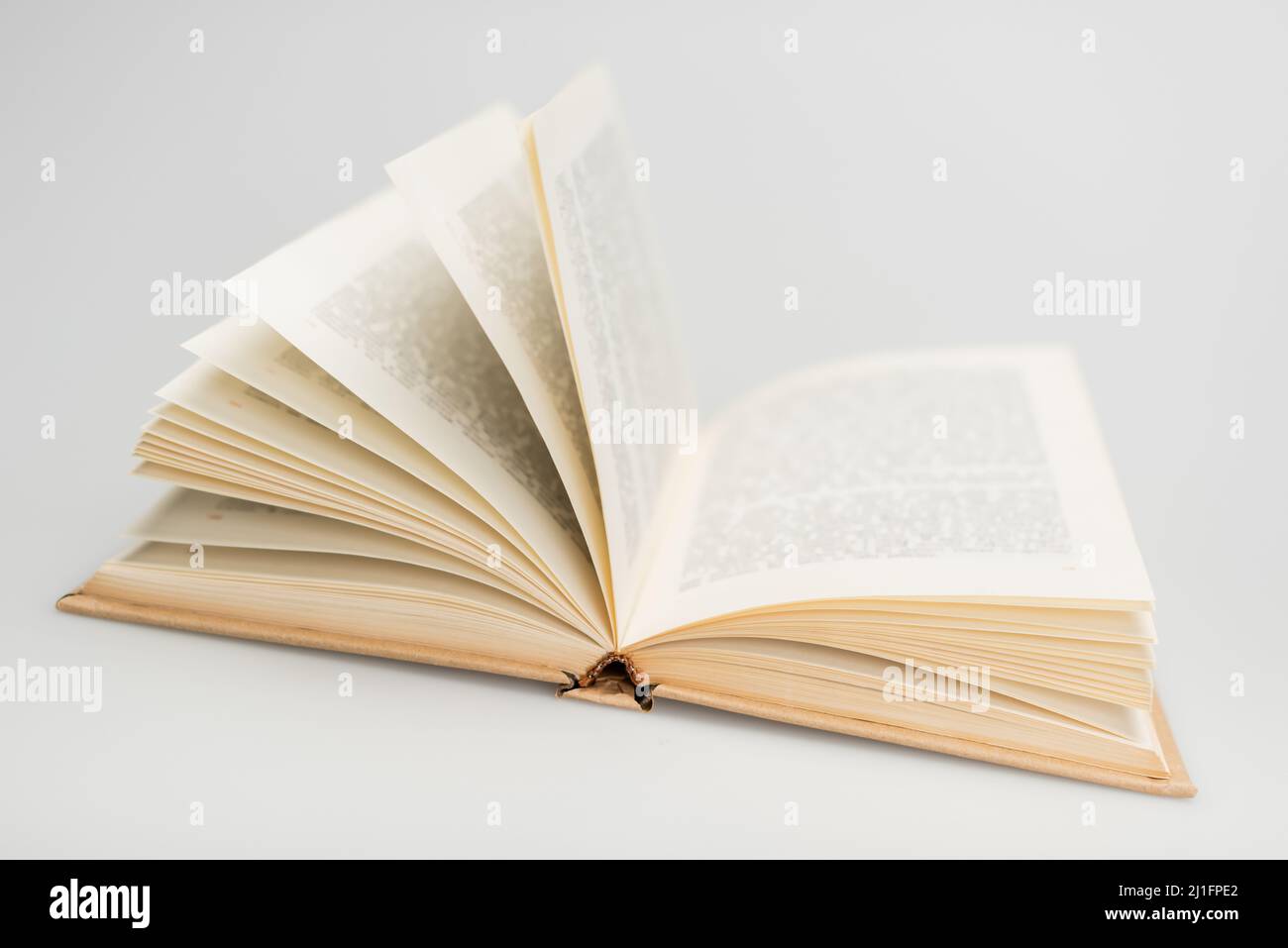 open book with text on light grey background Stock Photo - Alamy