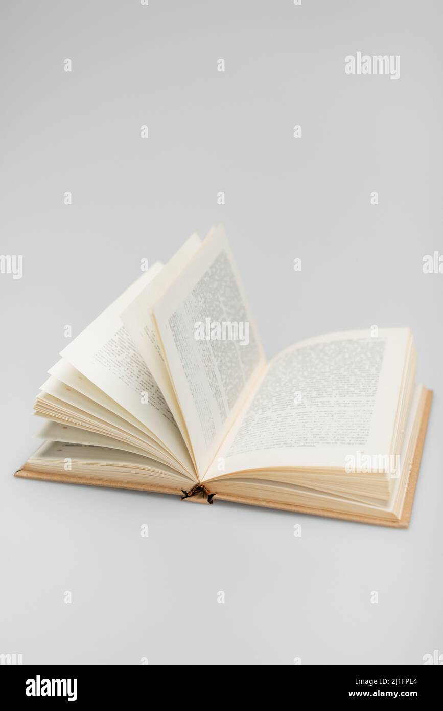 paper book with text on grey background with copy space Stock Photo - Alamy