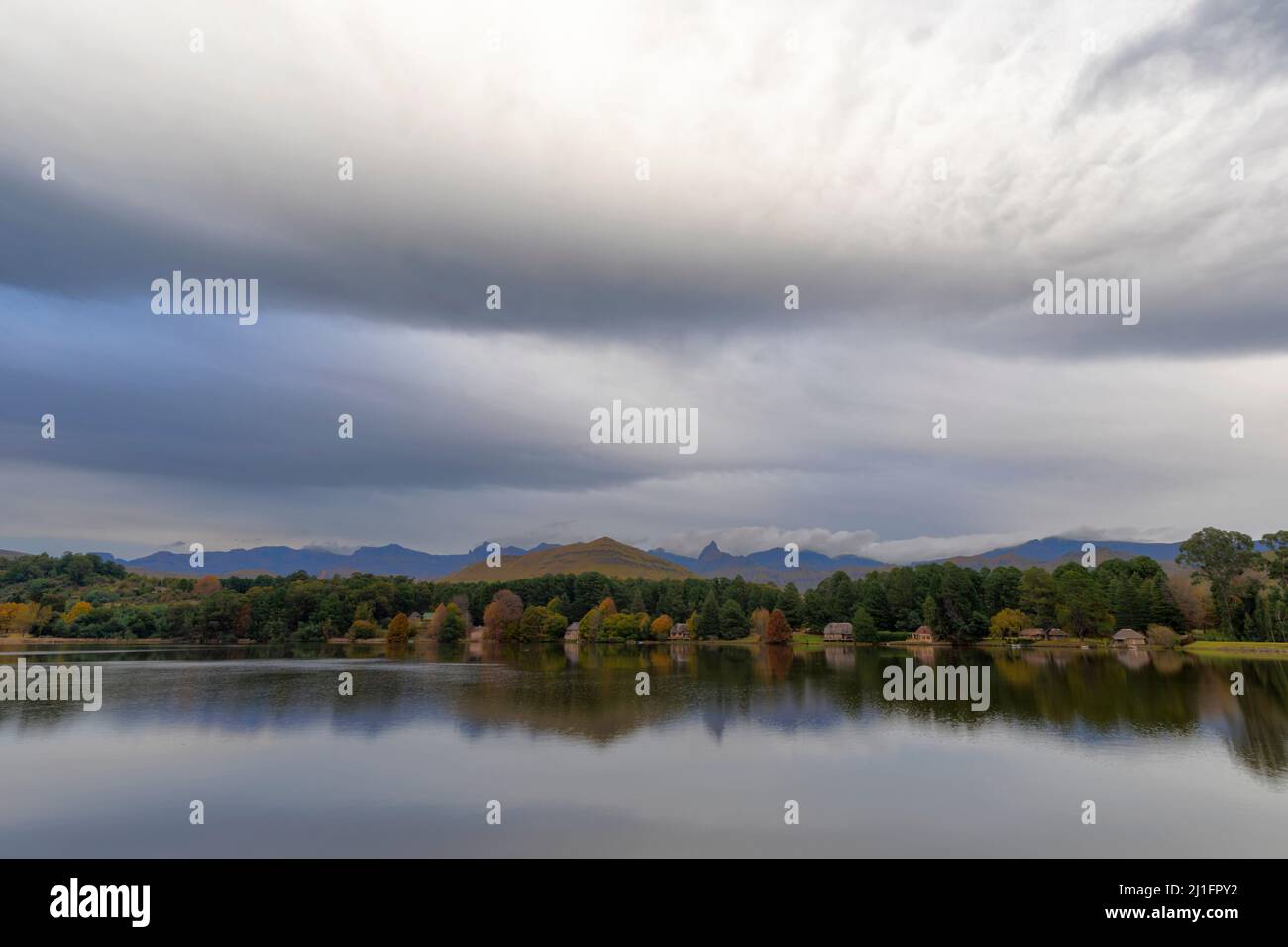 Dark bank of clouds at Lake Naverone Drakensberg South Africa Stock ...