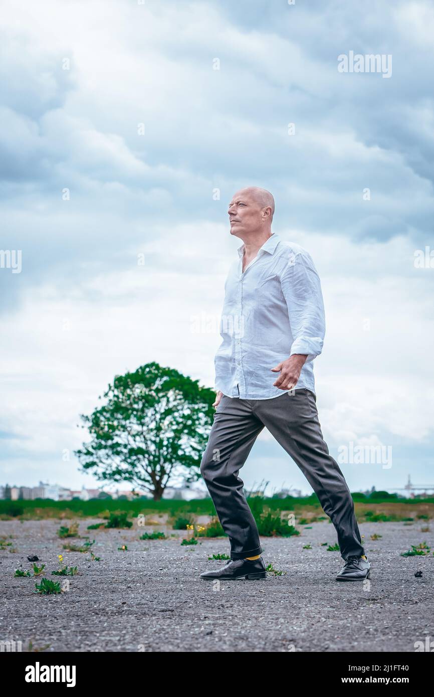 Handsome man in white shirt hi-res stock photography and images - Alamy