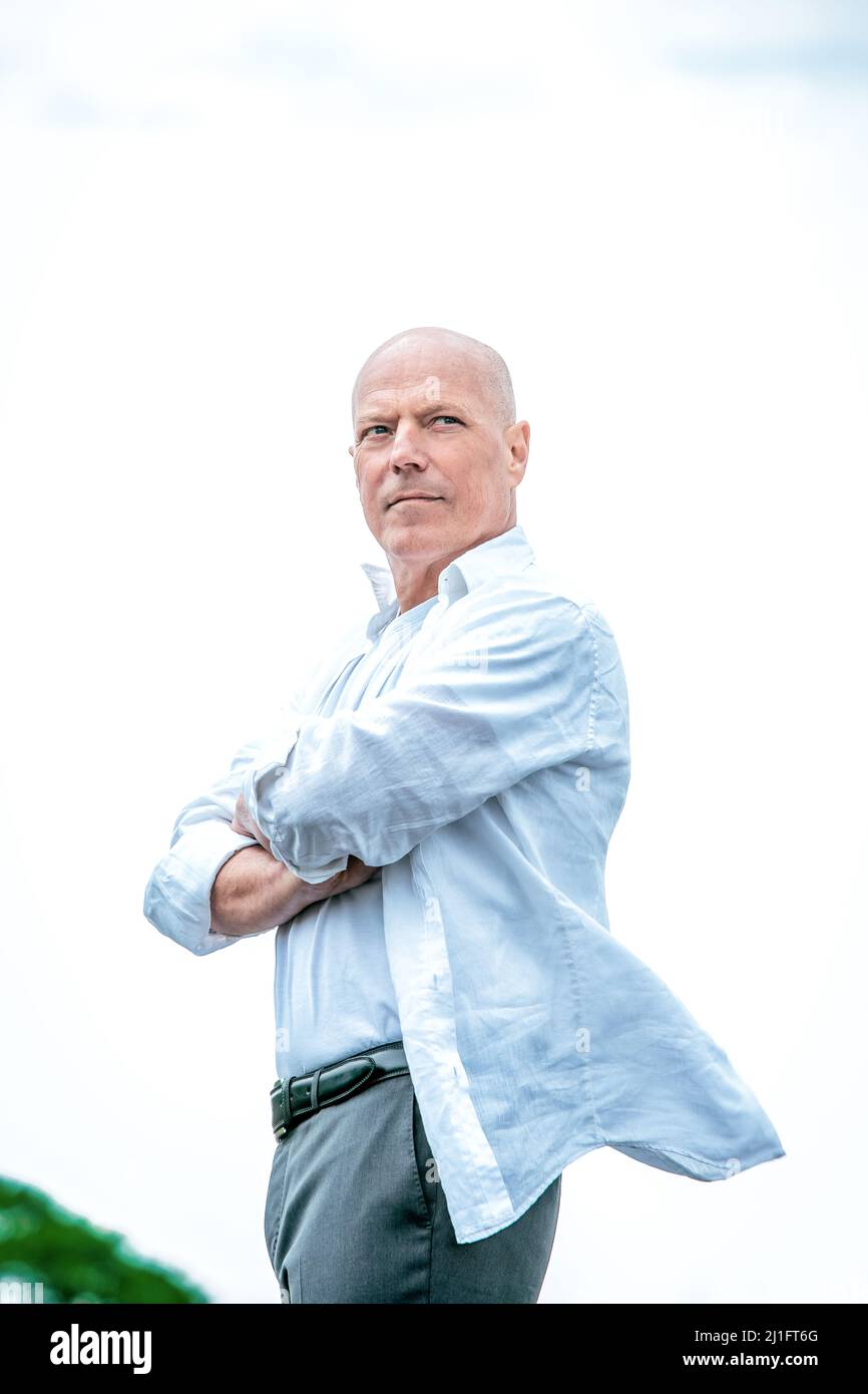 Handsome man in white shirt hi-res stock photography and images - Alamy