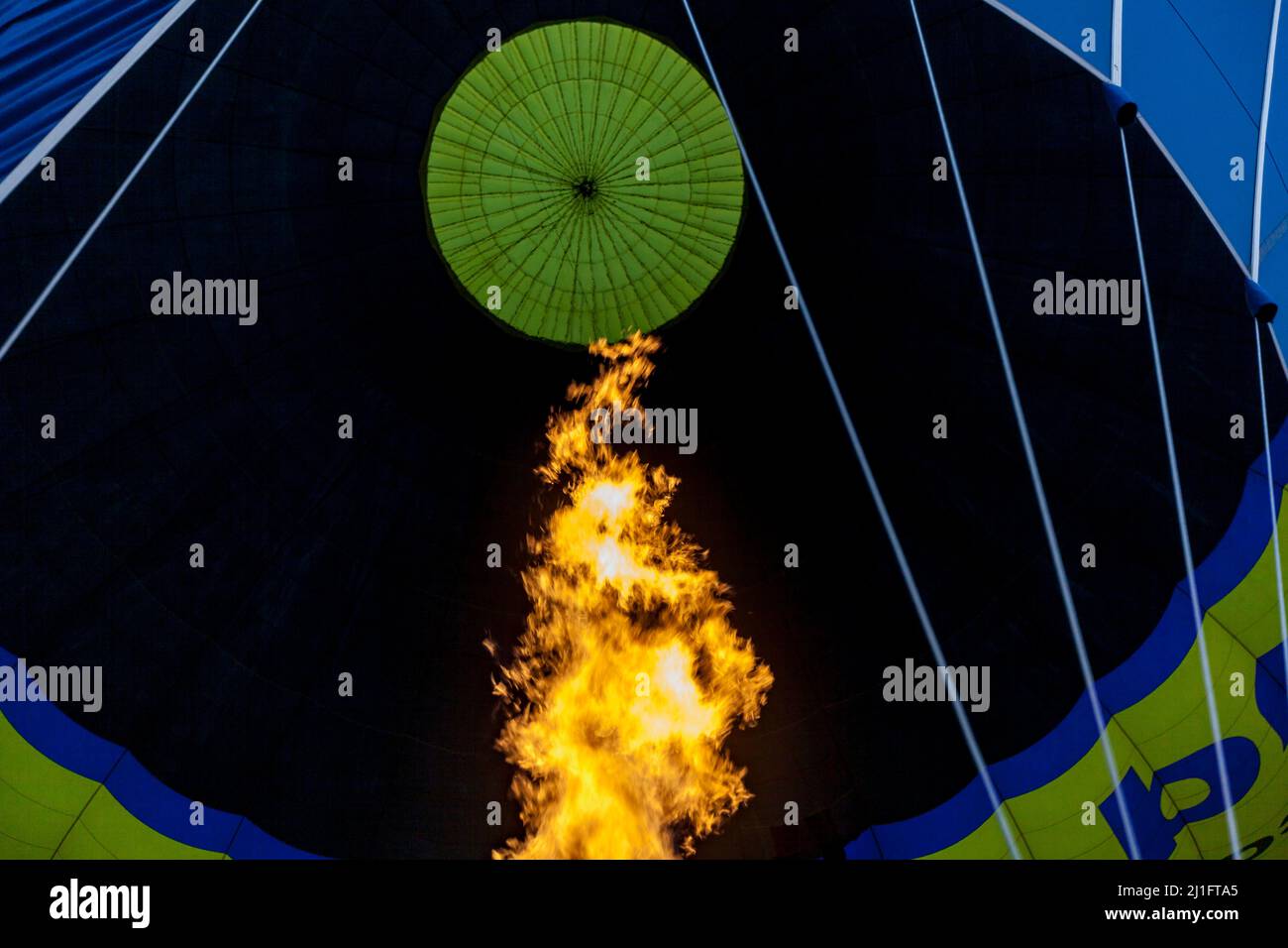 Gas flame heating up hot air balloon, Luxor Stock Photo - Alamy