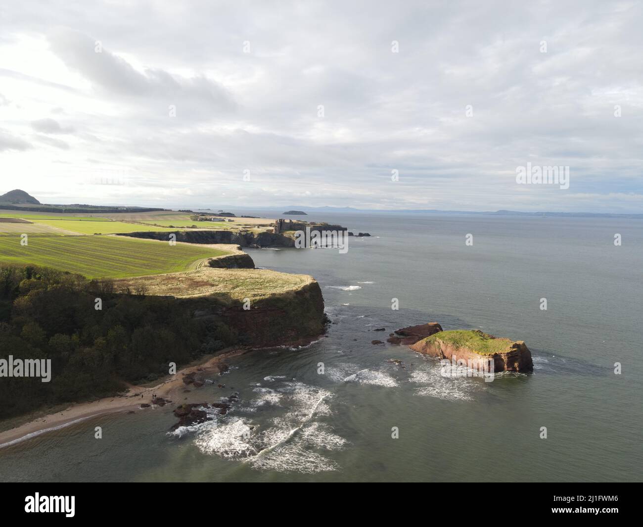 An aerial view of a cliff and sea in Edinburg Stock Photo - Alamy