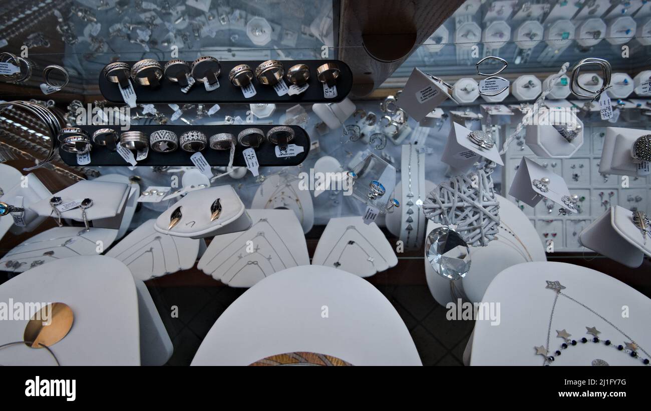 a close up of jewellery on a glass table Stock Photo - Alamy