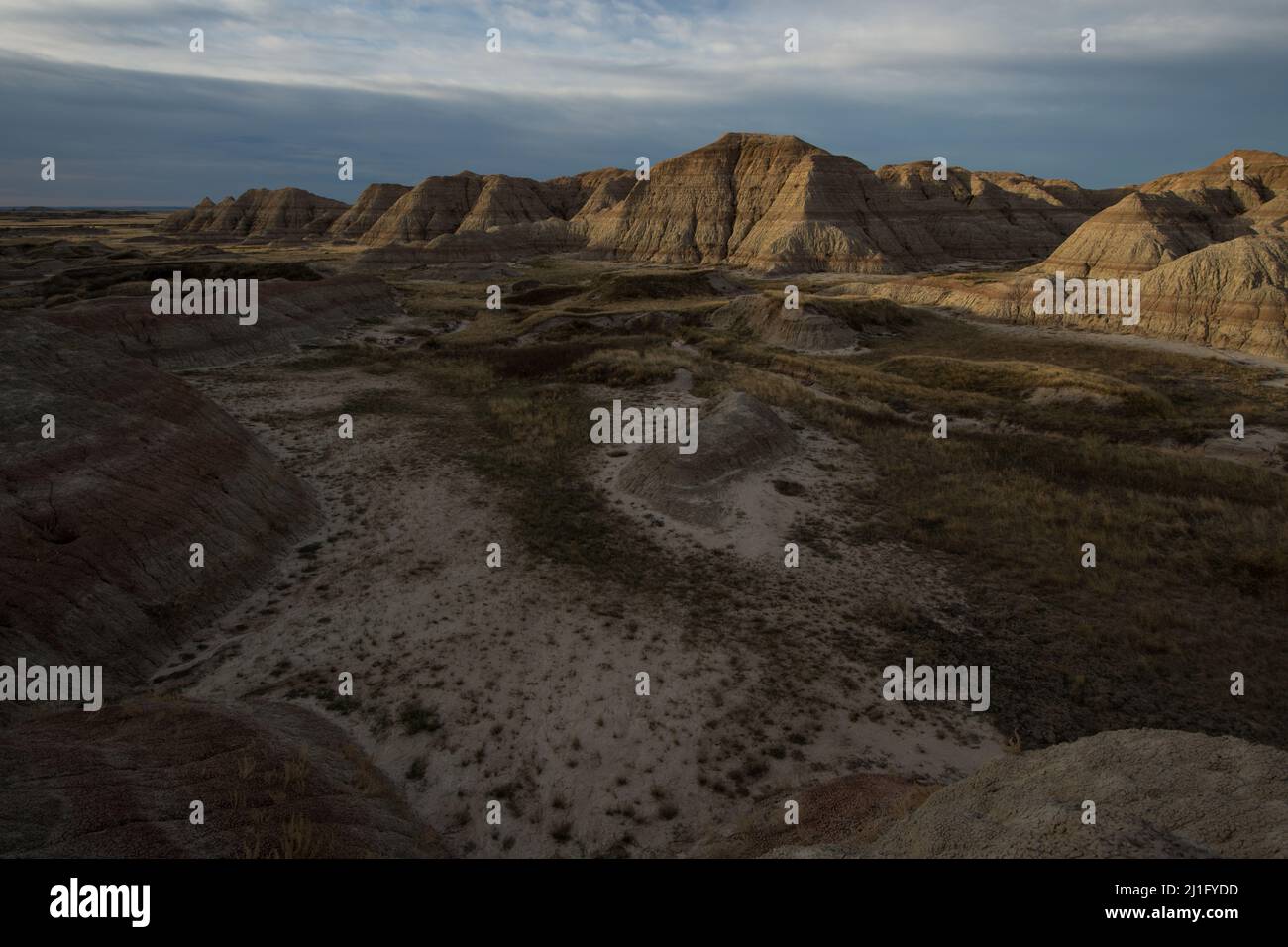 The badlands of South Dakota at sunrise with negative space Stock Photo ...