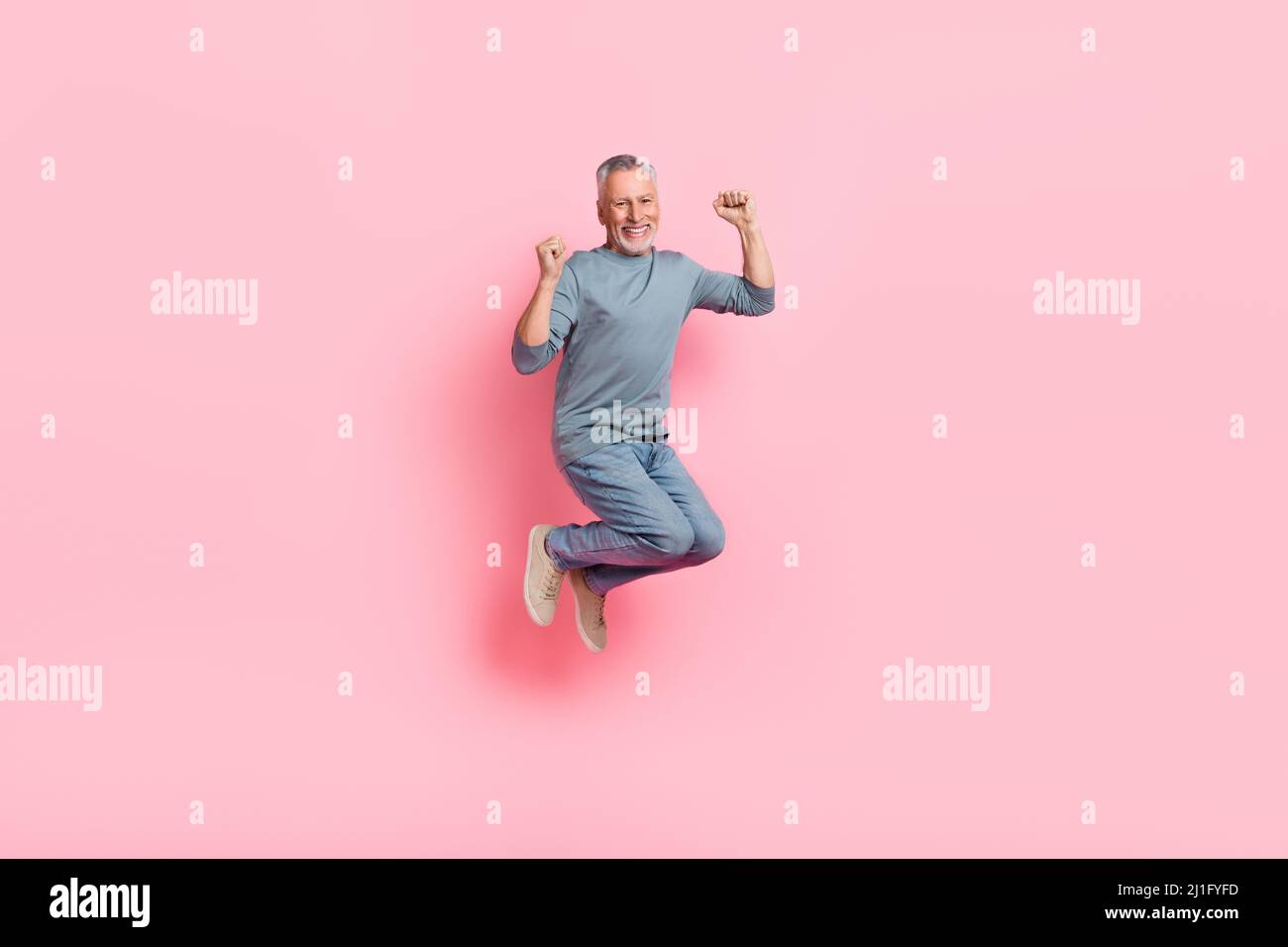 Full length body size view of attractive cheery grey-haired man jumping ...