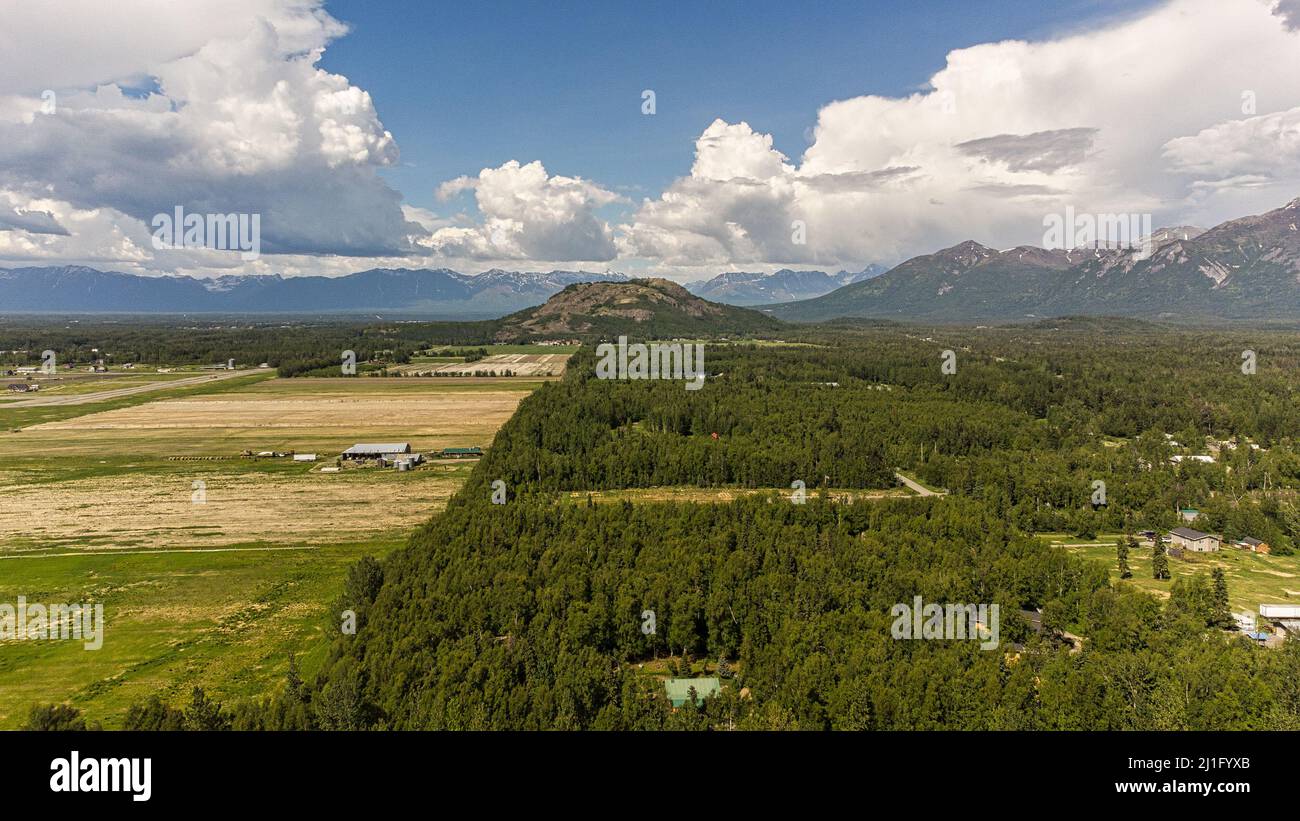 An aerial view of rural green areas of Palmer, Alaska in the Summer ...