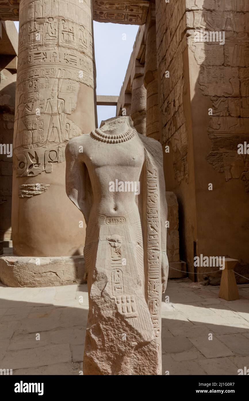 Headless statue with necklace and inscriptions in the Great Hypostyle ...
