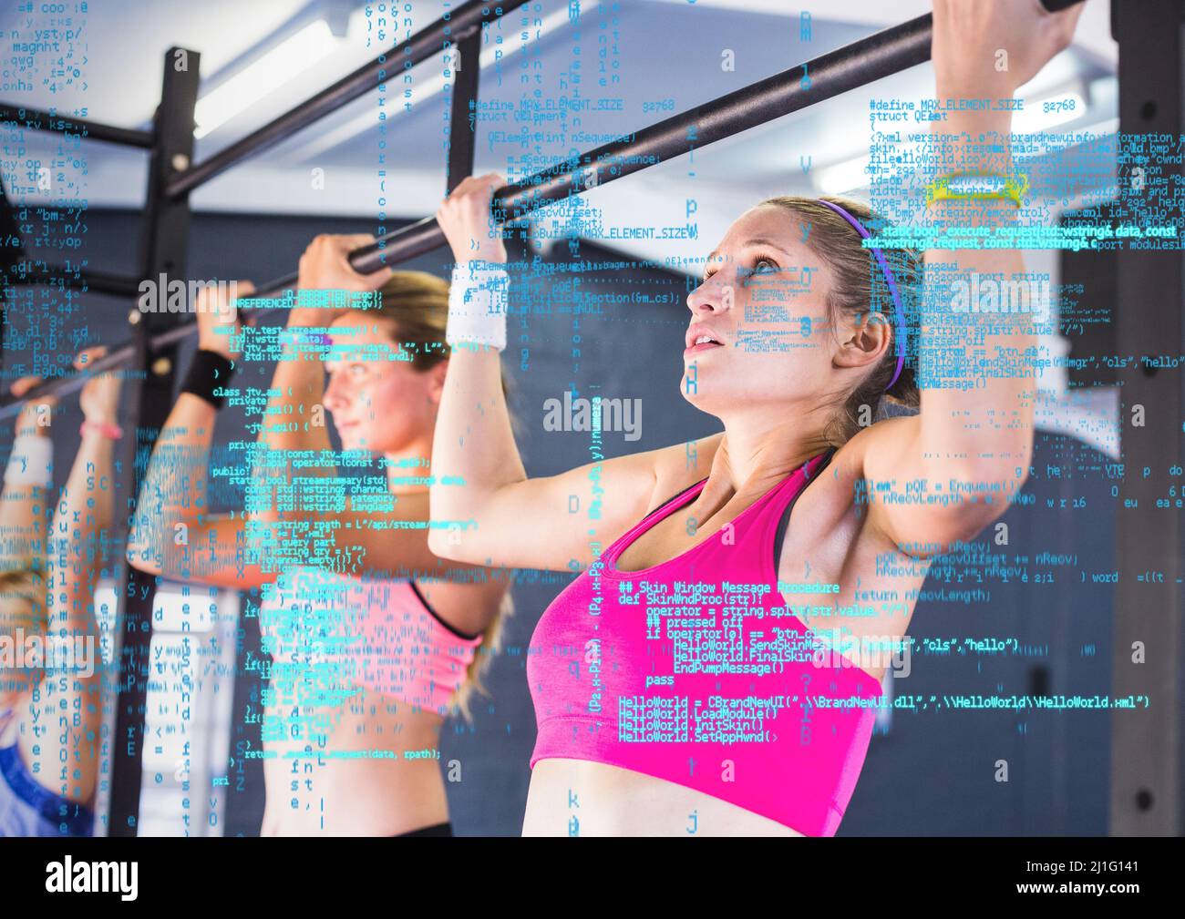 Data processing against caucasian fit woman performing pull up exercise ...