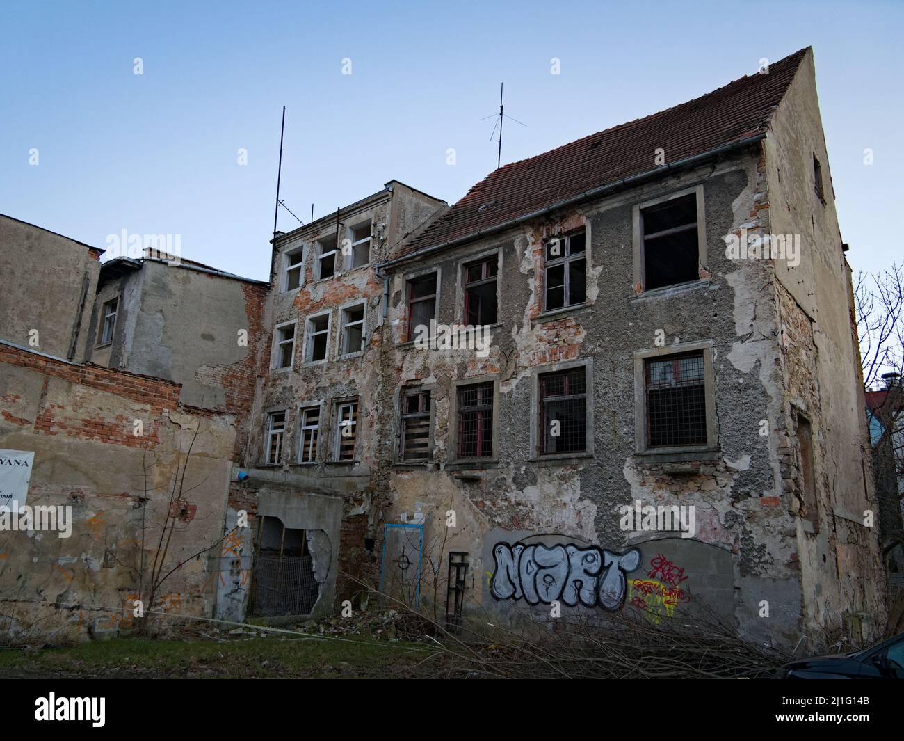 an old derelict dilapidated buildings without windows Stock Photo - Alamy