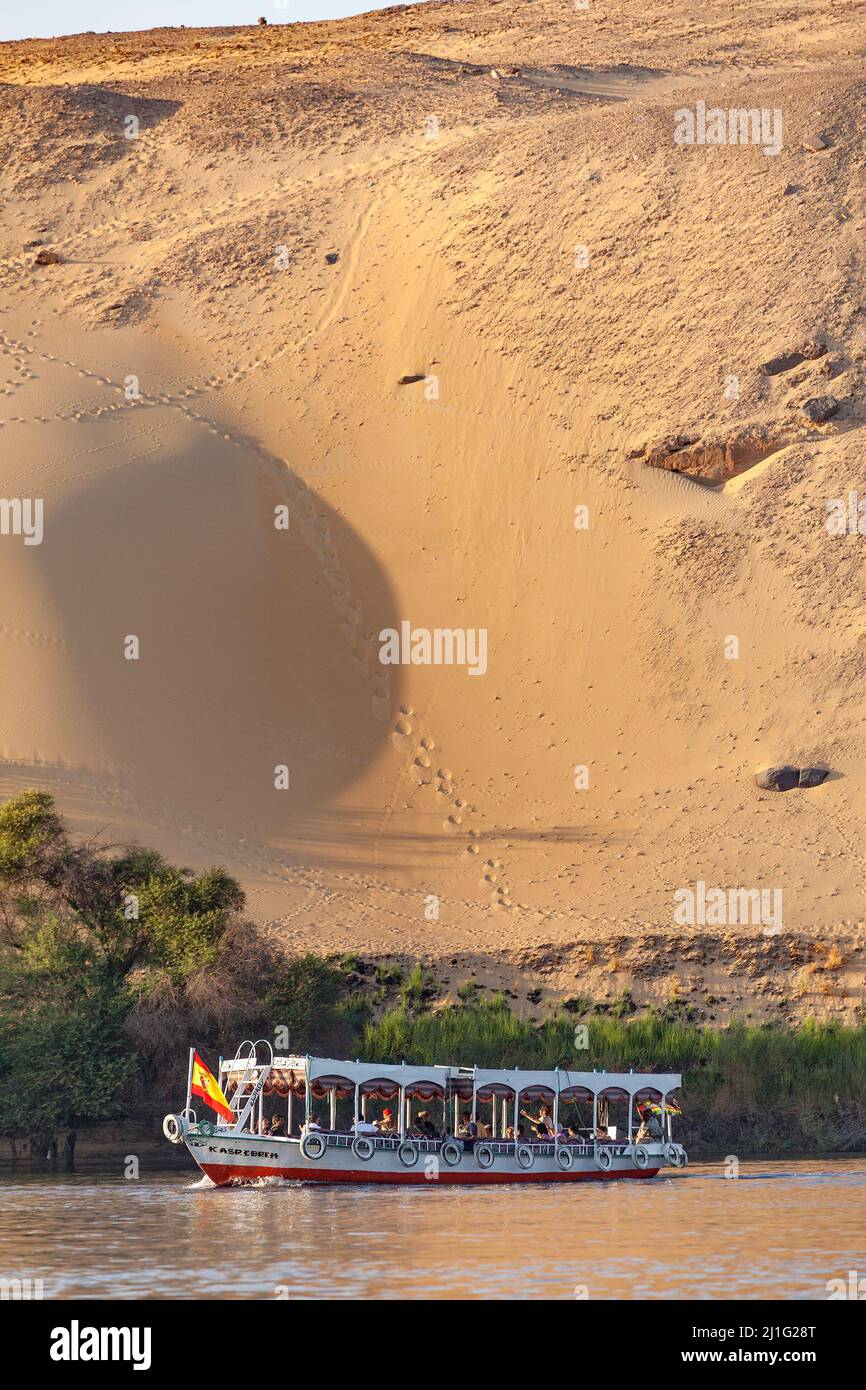 Riverboat on the Nile at Aswan, with sandy rock background Stock Photo ...