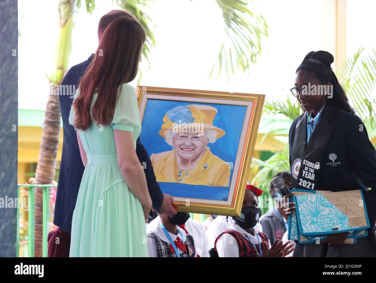 The Duke and Duchess of Cambridge view a portrait of the Queen during a ...