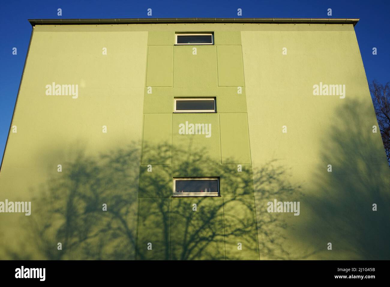 a photo of apartment building from side Stock Photo - Alamy